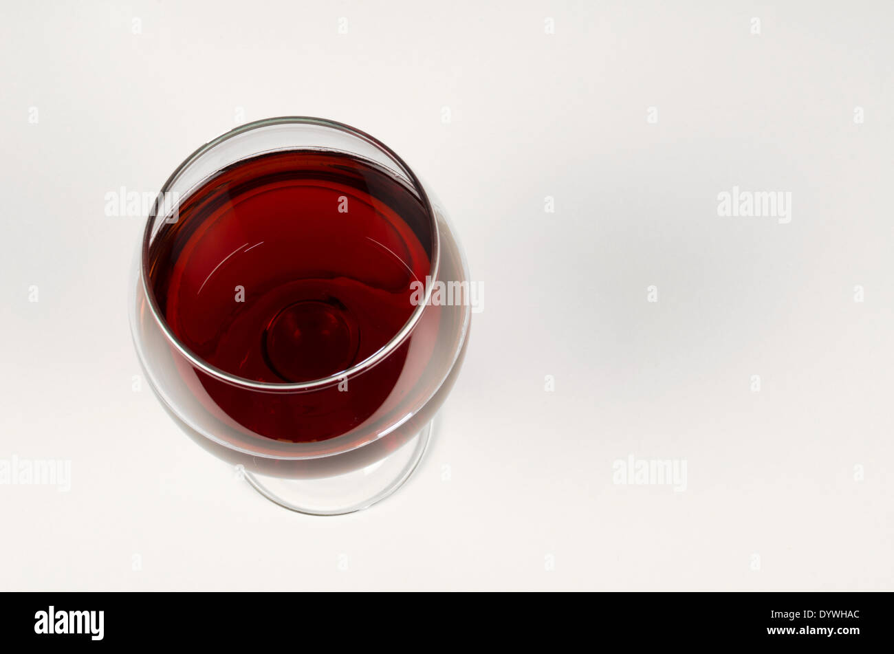 High angle viewpoint take of a glass of red wine Stock Photo - Alamy