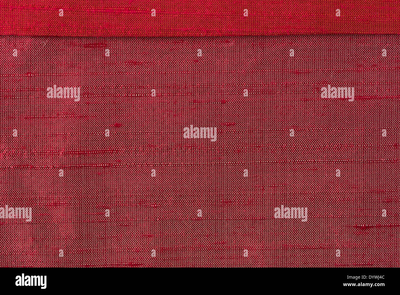 Closeup detail of red fabric texture background Stock Photo - Alamy