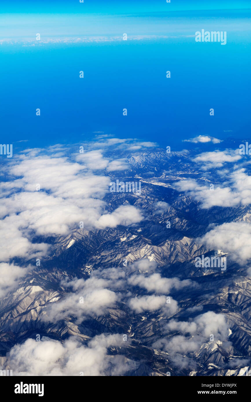 Aerial view of mountain landscape under blue sky in Japan Stock Photo ...