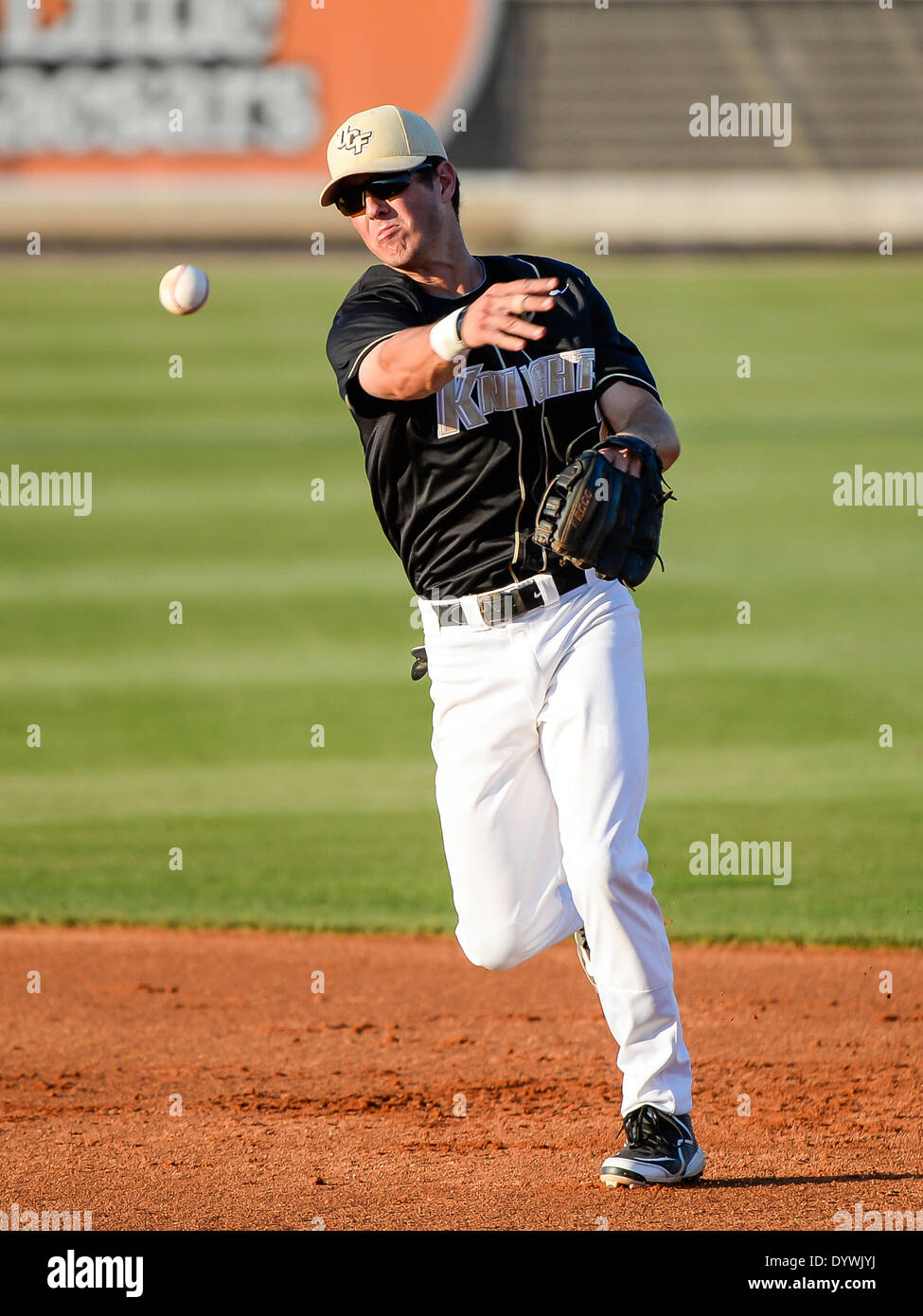 April 25, 2014 - Orlando, FL, U.S: UCF infielder Dylan Moore (2) throws ...