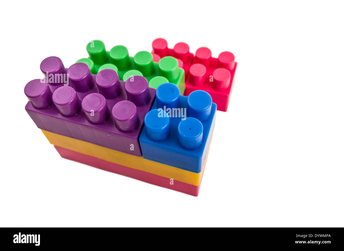 building blocks wall on a white background Stock Photo - Alamy