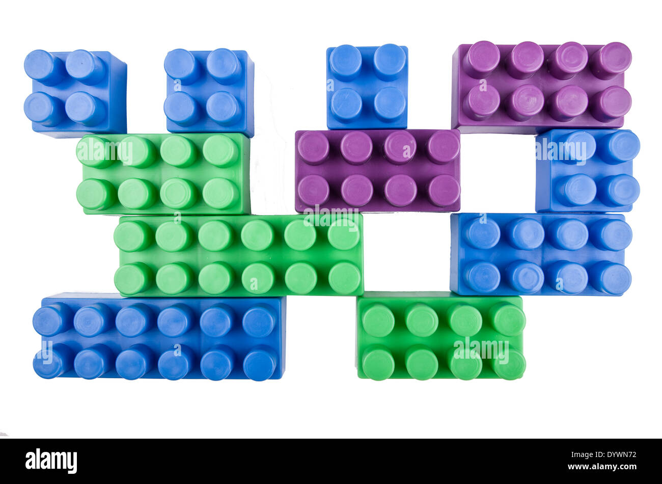 building blocks pieces joining on a white background Stock Photo - Alamy