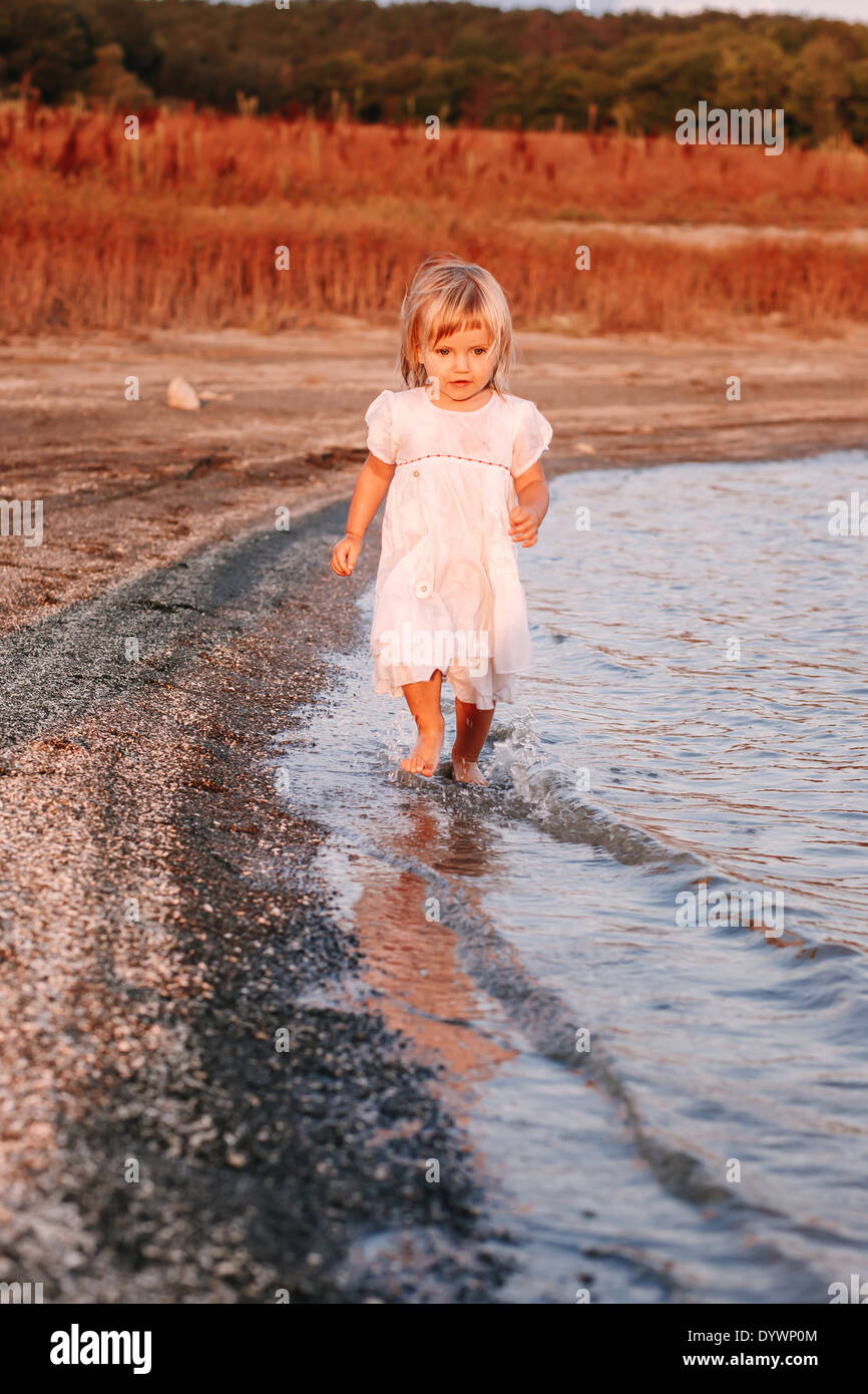Baby girl ocean hi-res stock photography and images - Alamy