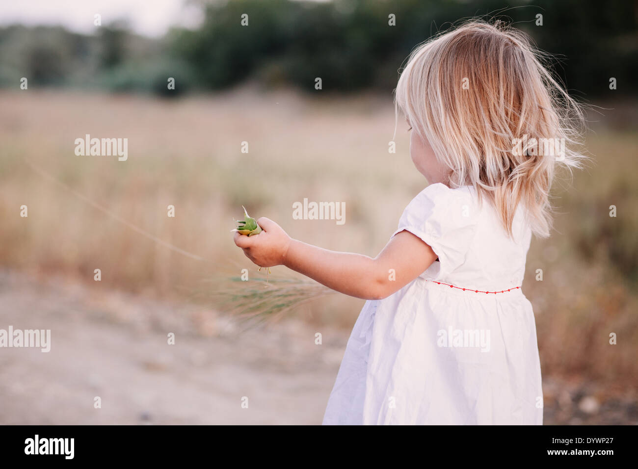 Little girl walking Stock Photo - Alamy