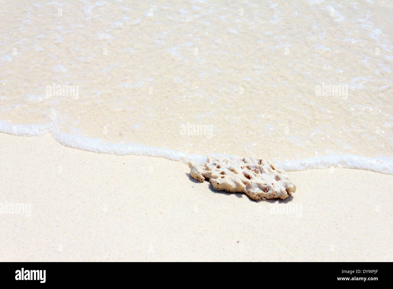 Blue water texture with small stones Stock Photo - Alamy