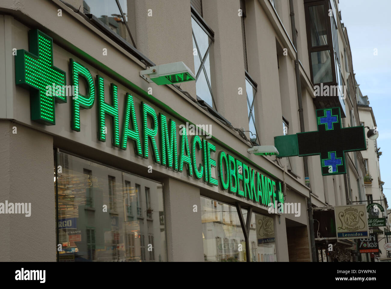 Pharmacy sign, Paris, France Stock Photo - Alamy