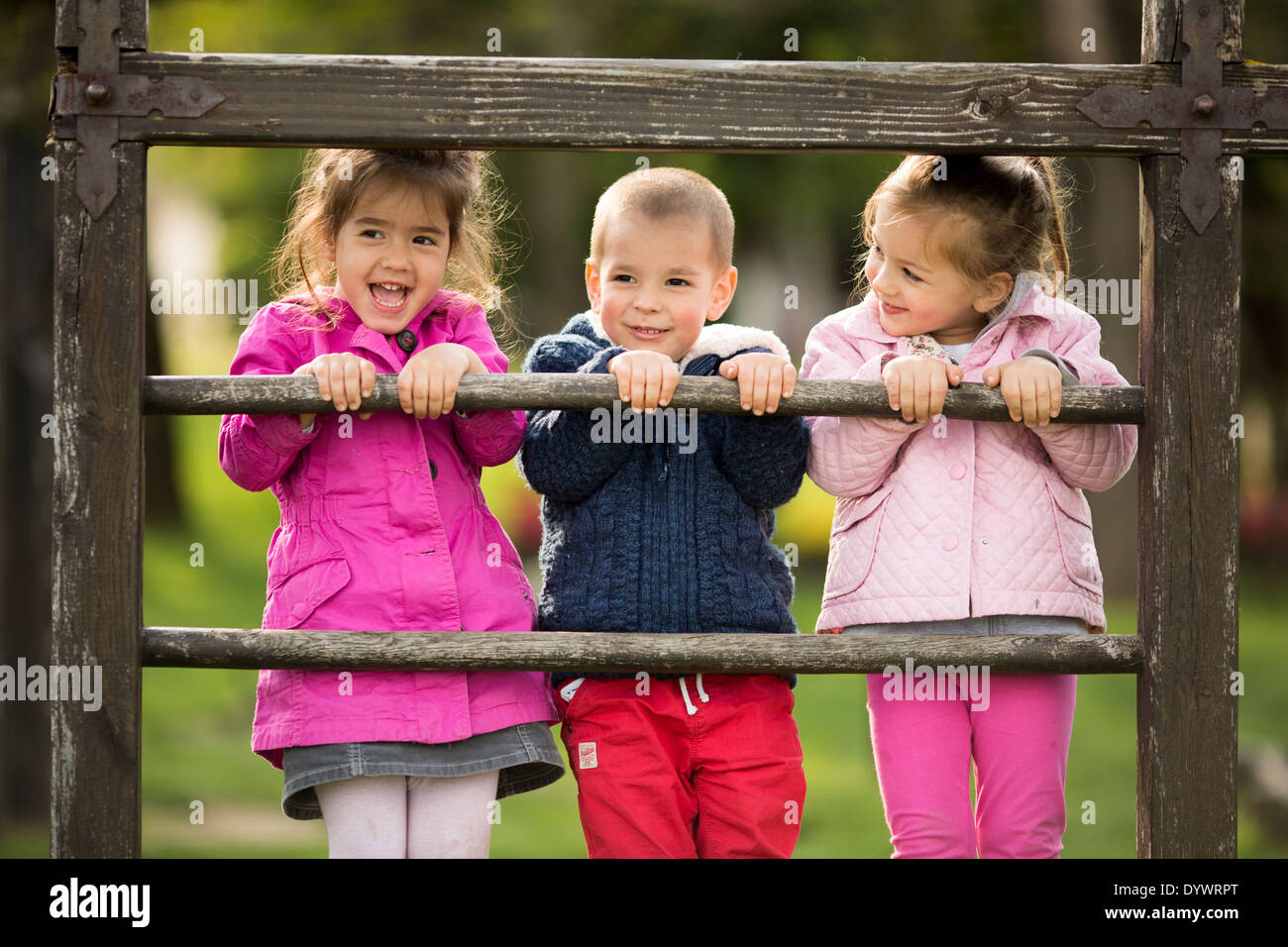 Kids playing at playground hi-res stock photography and images - Alamy