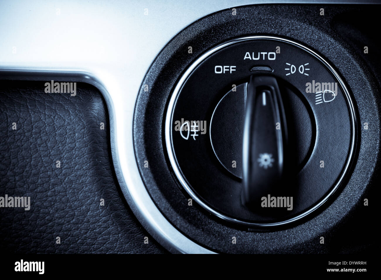Detail of the headlight button in a car Stock Photo - Alamy