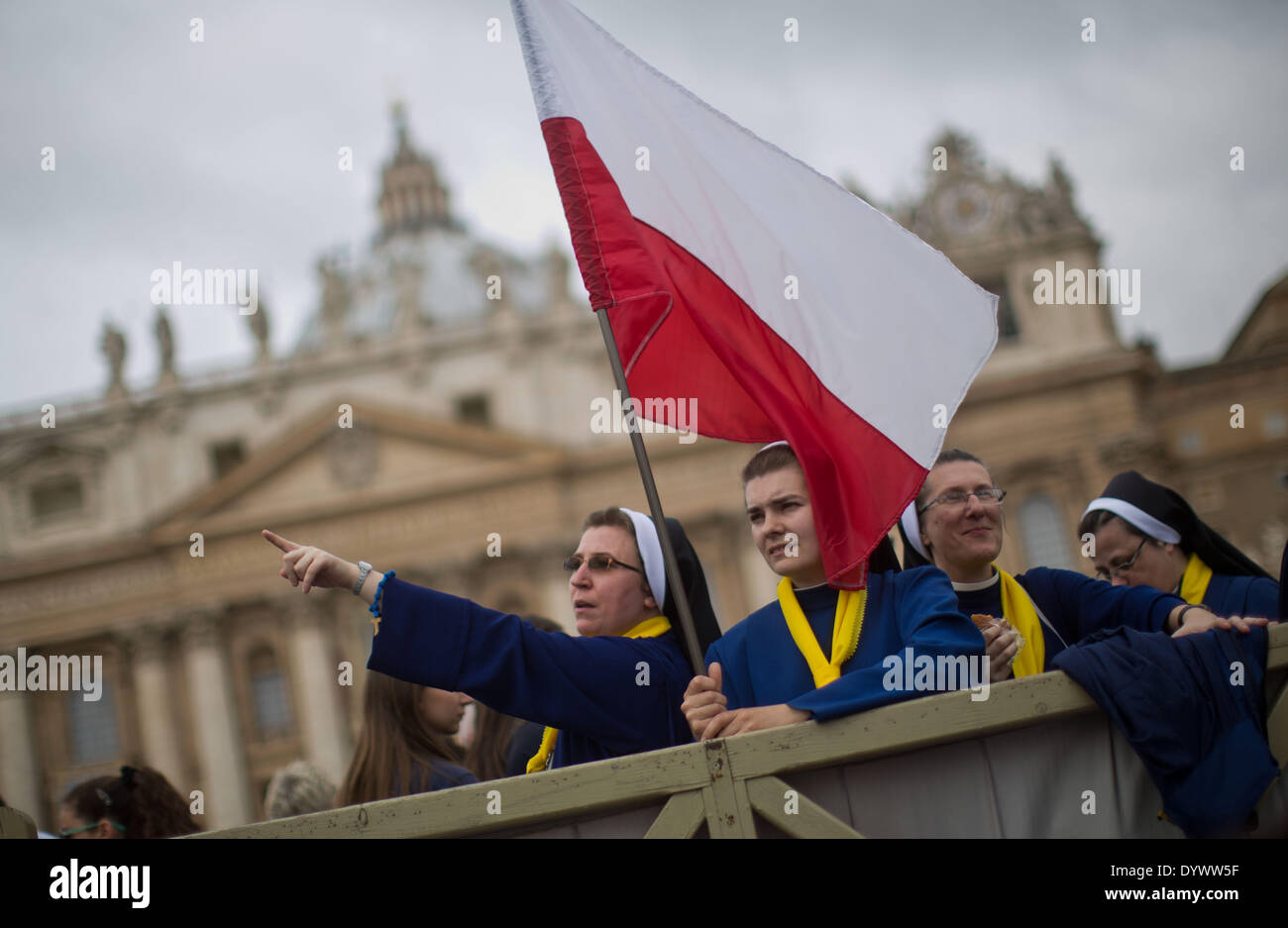 Vatican, Rome, Italy. 26th Apr, 2014. Polish sisters hold a Polish flag ...