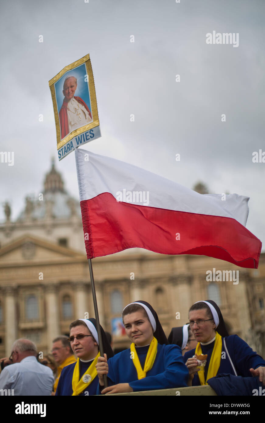 Vatican, Rome, Italy. 26th Apr, 2014. Polish sisters hold a Polish flag ...