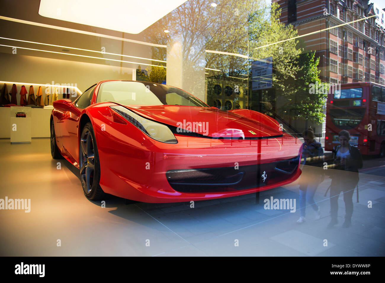 Red Ferrari in a Ferrari showroom in the exclusive area of ...