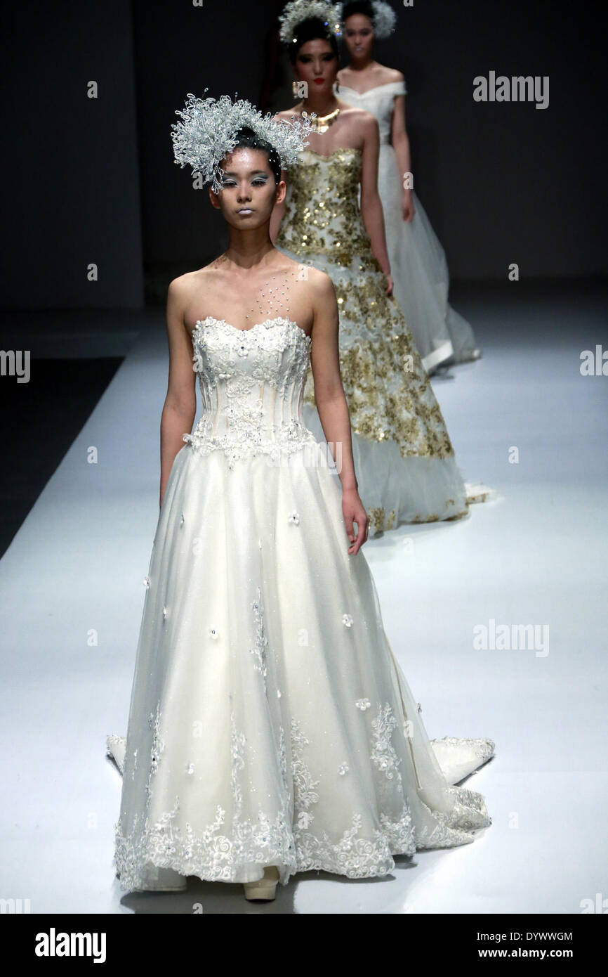 Beijing, China. 26th Apr, 2014. Models present creations designed by ...