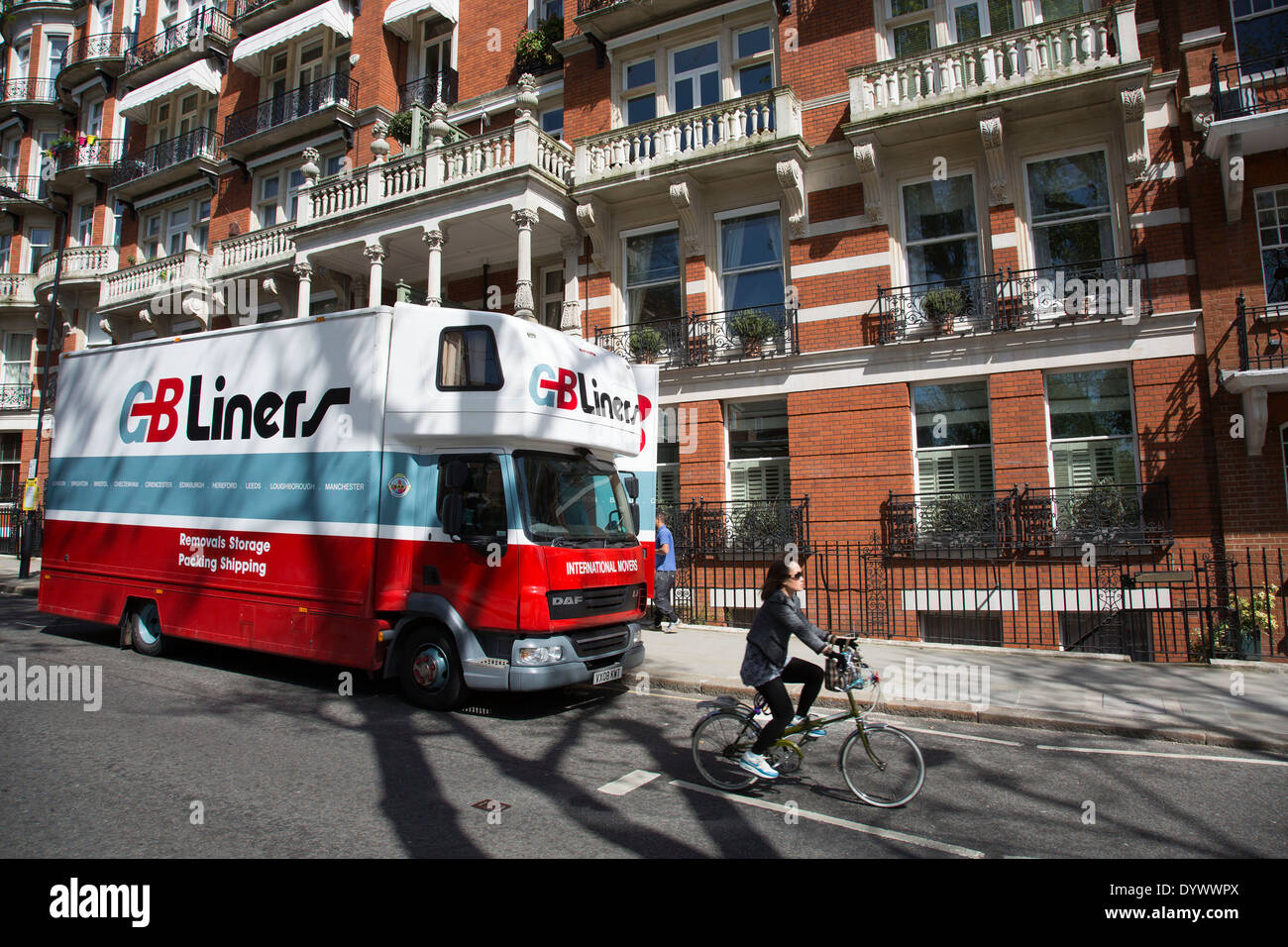 Removal van in an exclusive residential street scene in Kensington ...