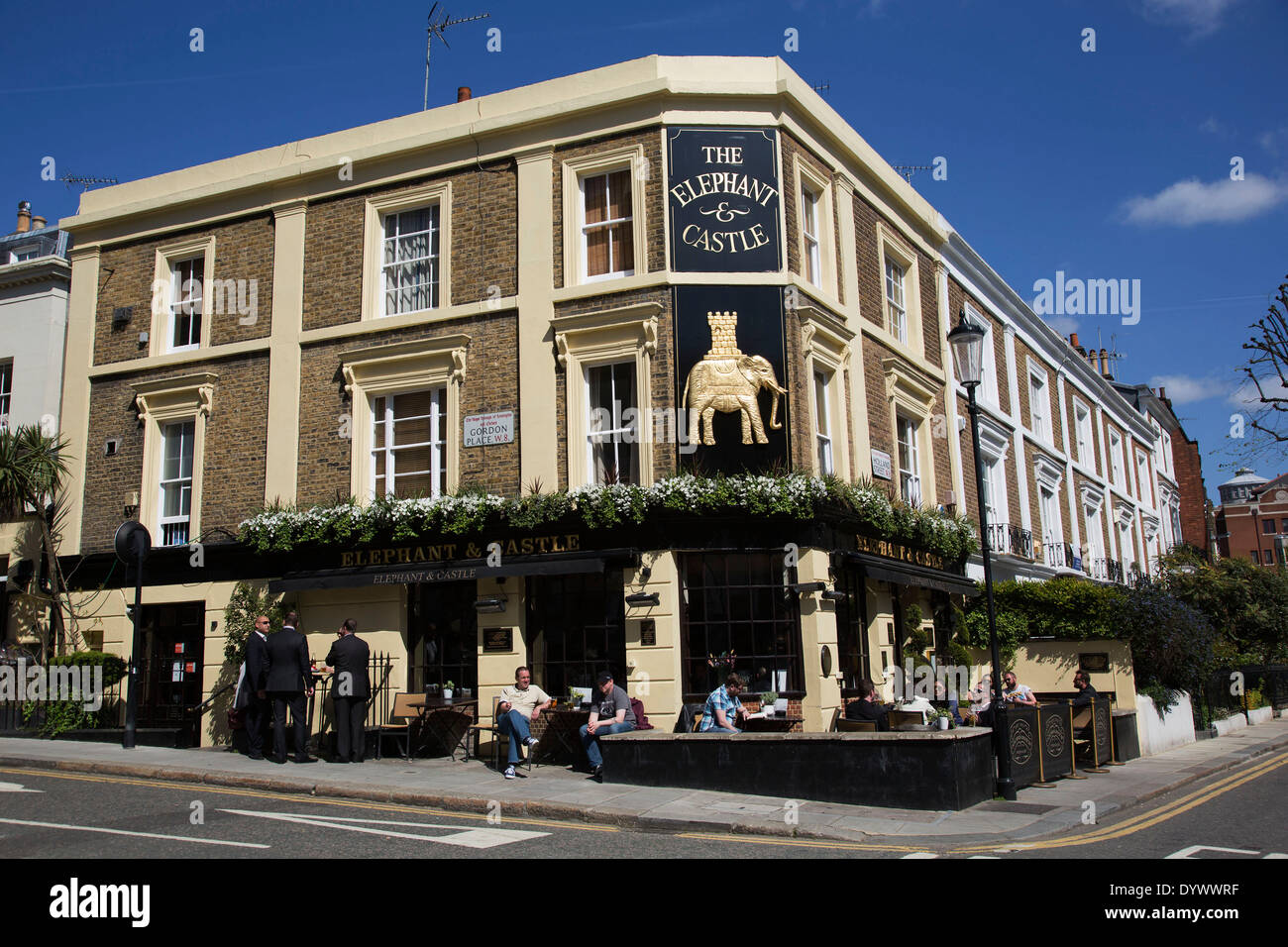 People outside the Elephant and Castle pub in a residential street ...