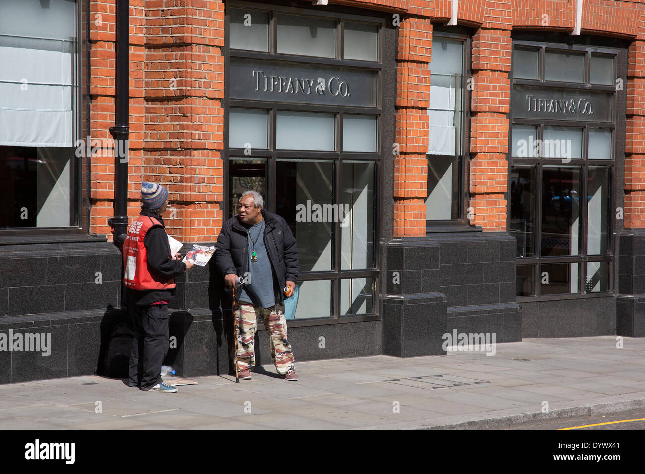 Homeless magazine, Big Issue seller outside Tiffany and Co jewelery ...