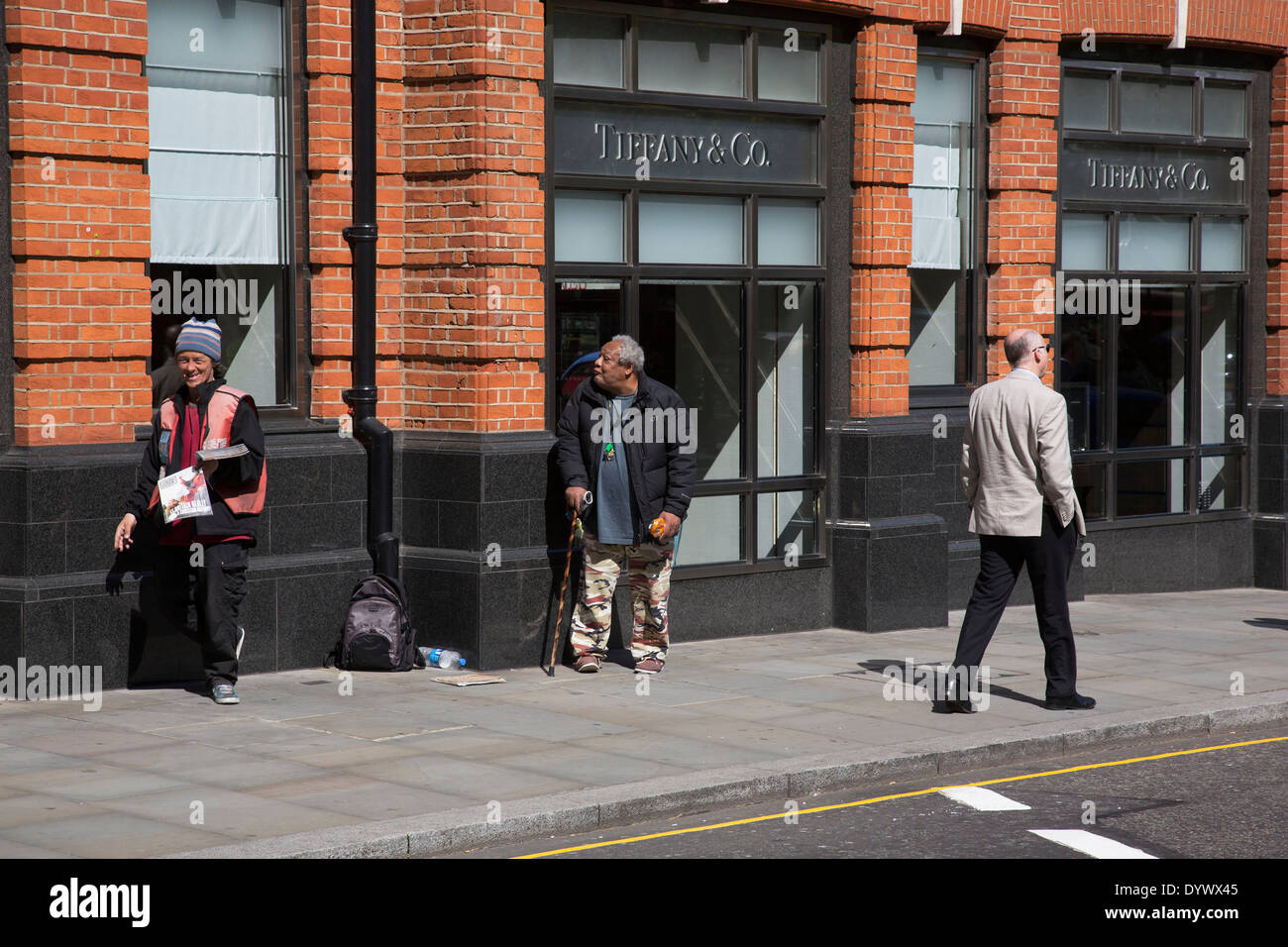 Homeless magazine, Big Issue seller outside Tiffany and Co jewelery ...