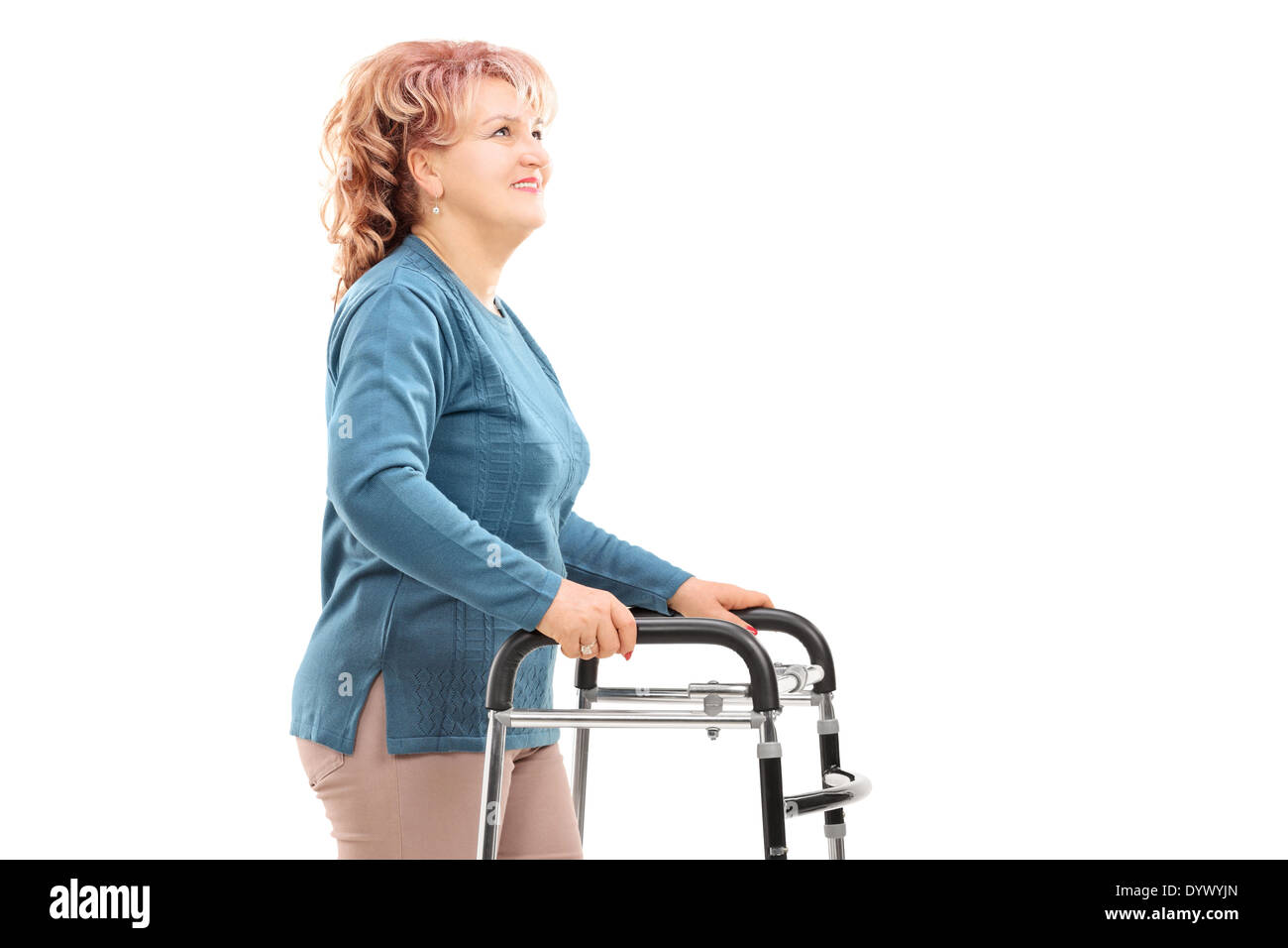 Mature woman with walker looking up Stock Photo - Alamy