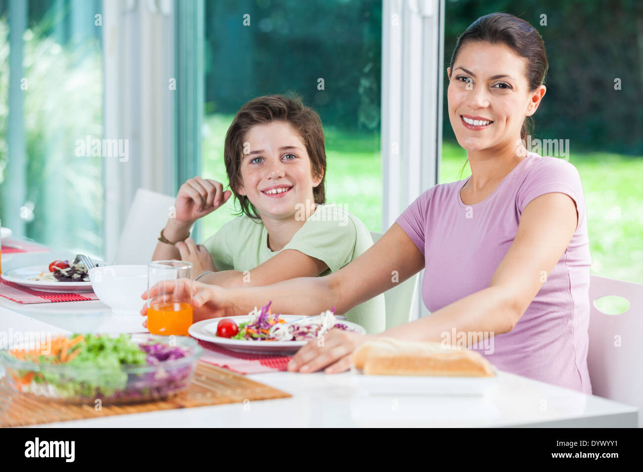 Mother and son laughing meal hi-res stock photography and images - Alamy