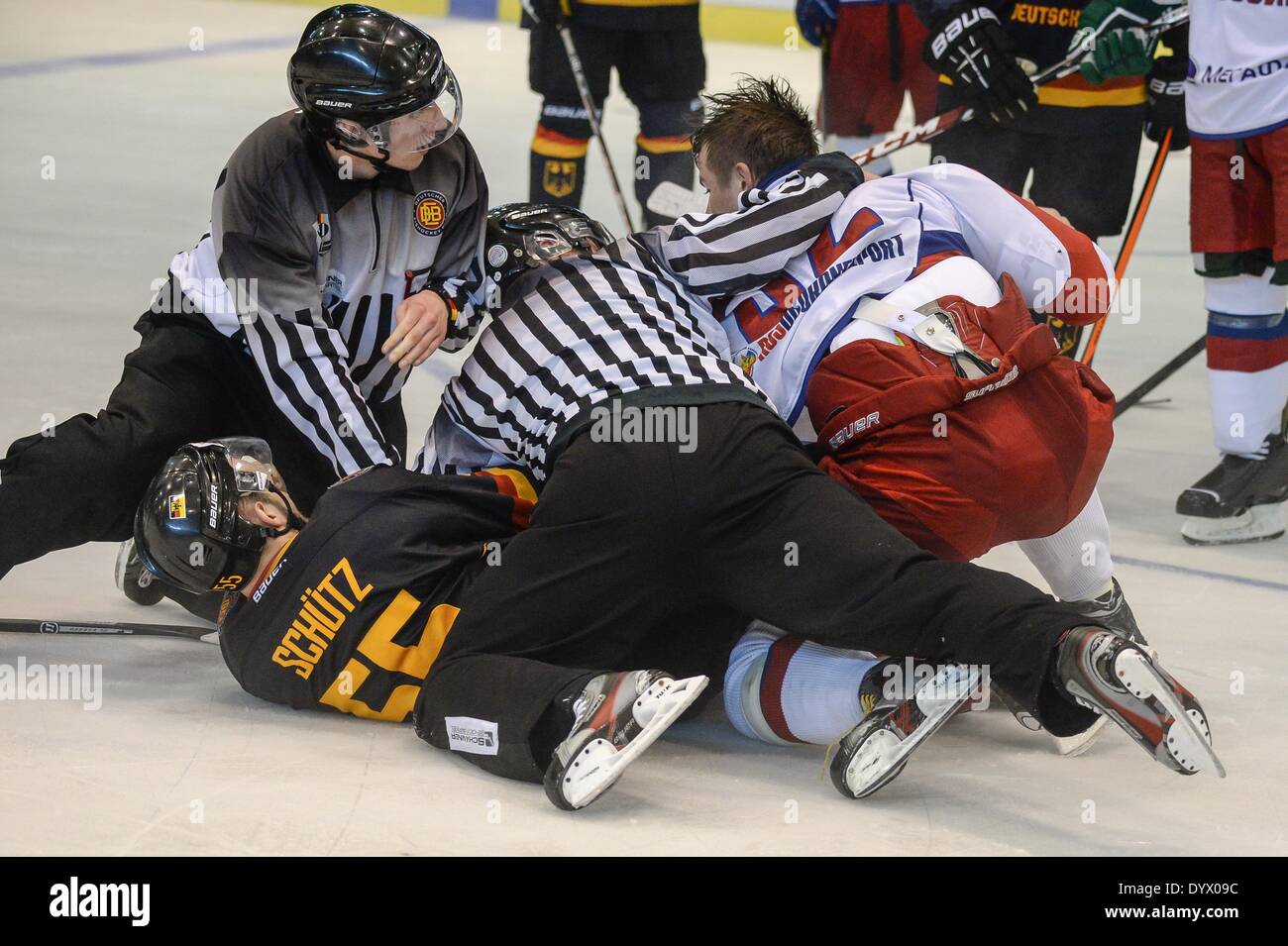 Landshut, Germany. 26th Apr, 2014. Germany's Felix Schuetz (L) vies for ...