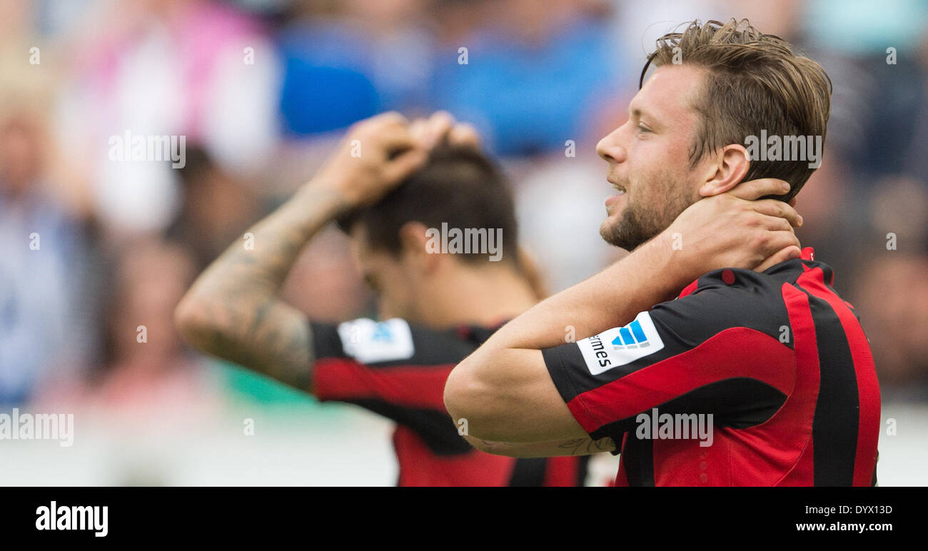 Sinsheim, Germany. 26th Apr, 2014. Frankfurt's Marco Russ (R) during ...