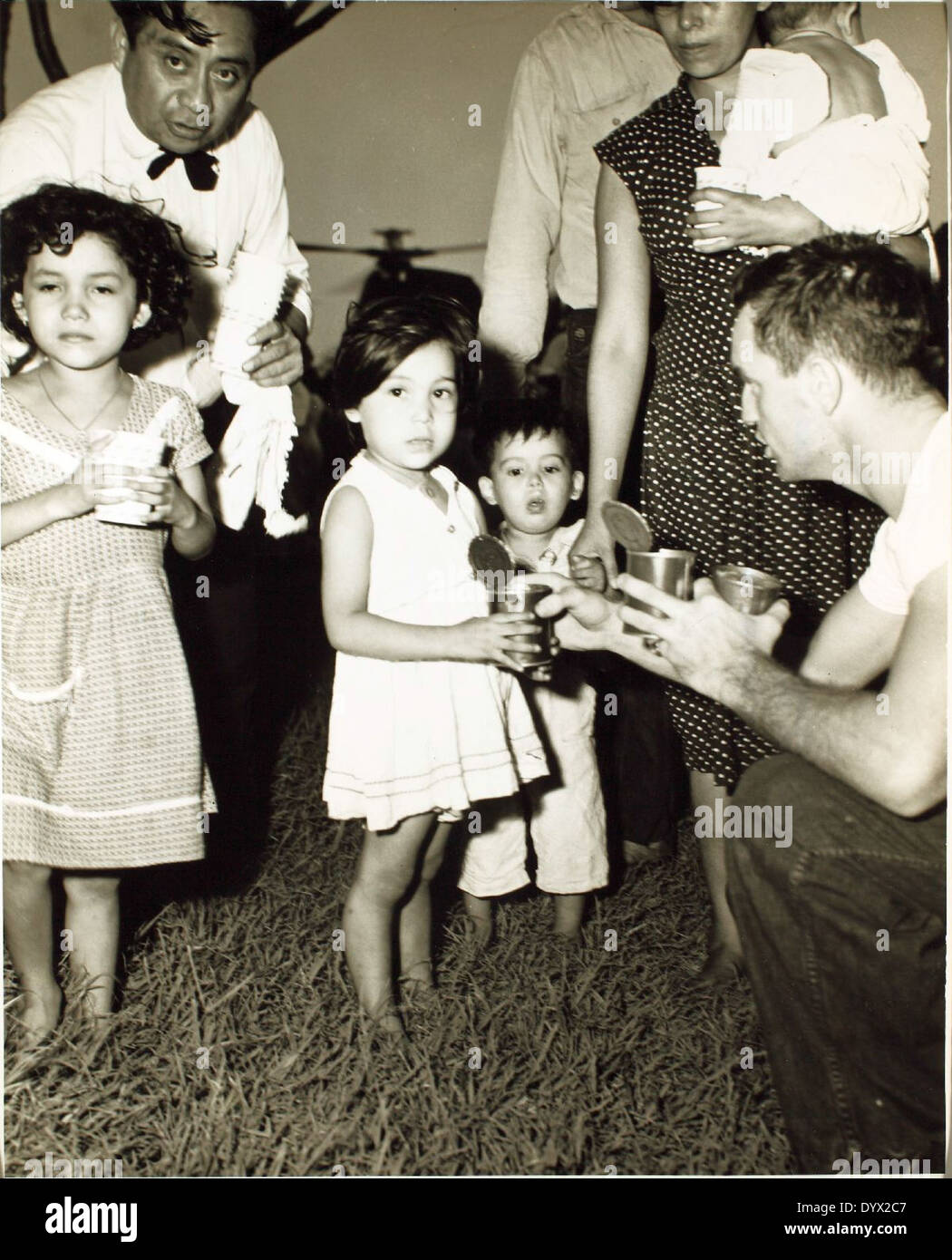 This photograph shows food being distributed to victims of Hurricane ...