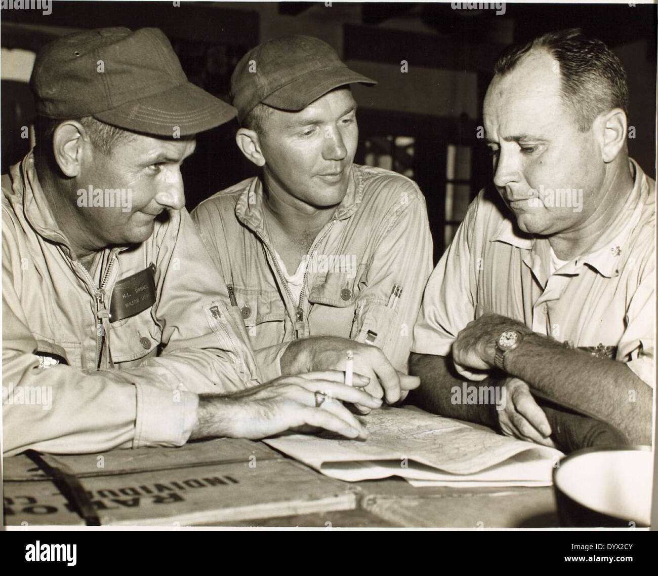 This historical photo shows U.S. military personnel inventorying ...