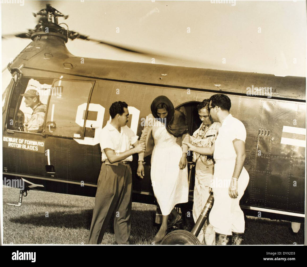 In the aftermath of Hurricane Janet in 1955, a U.S. Navy helicopter ...