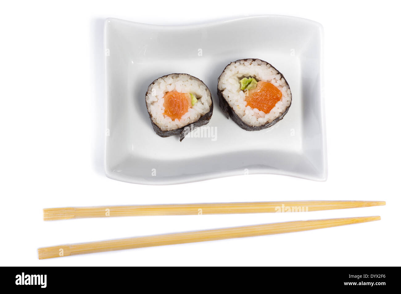 Two Maki Sushi in a tray shots from above isolated on white background with chopsticks Stock ...