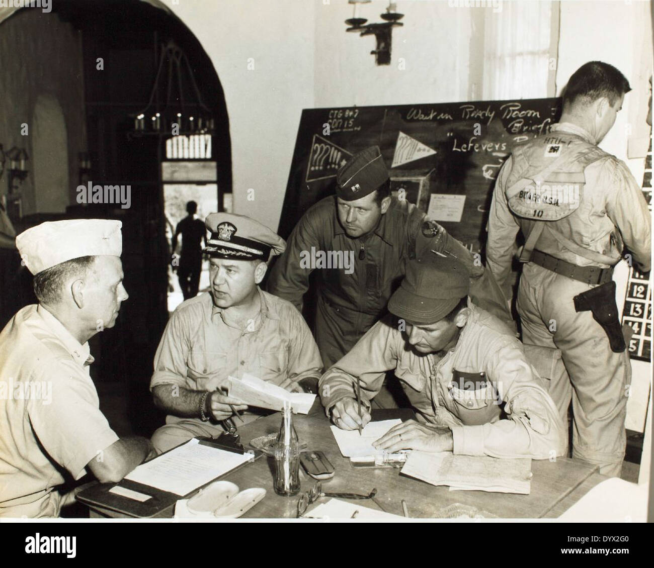 This photo captures the Operations Officer, Admiral Mile, and Captain ...