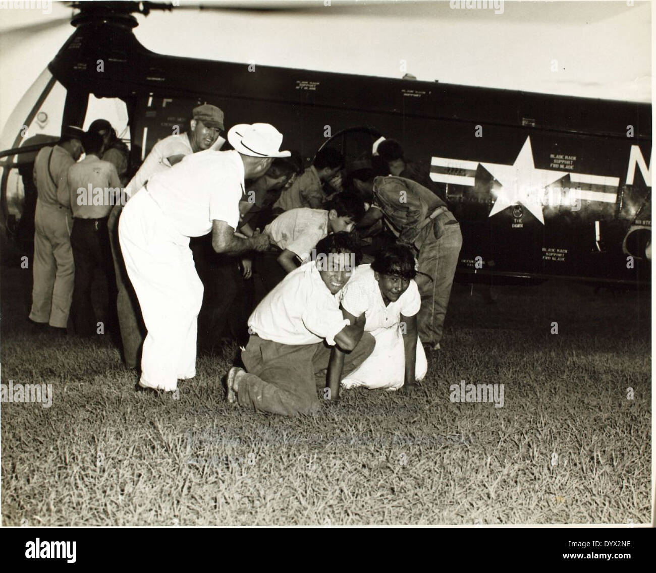 This photo documents the evacuation of victims following Hurricane ...