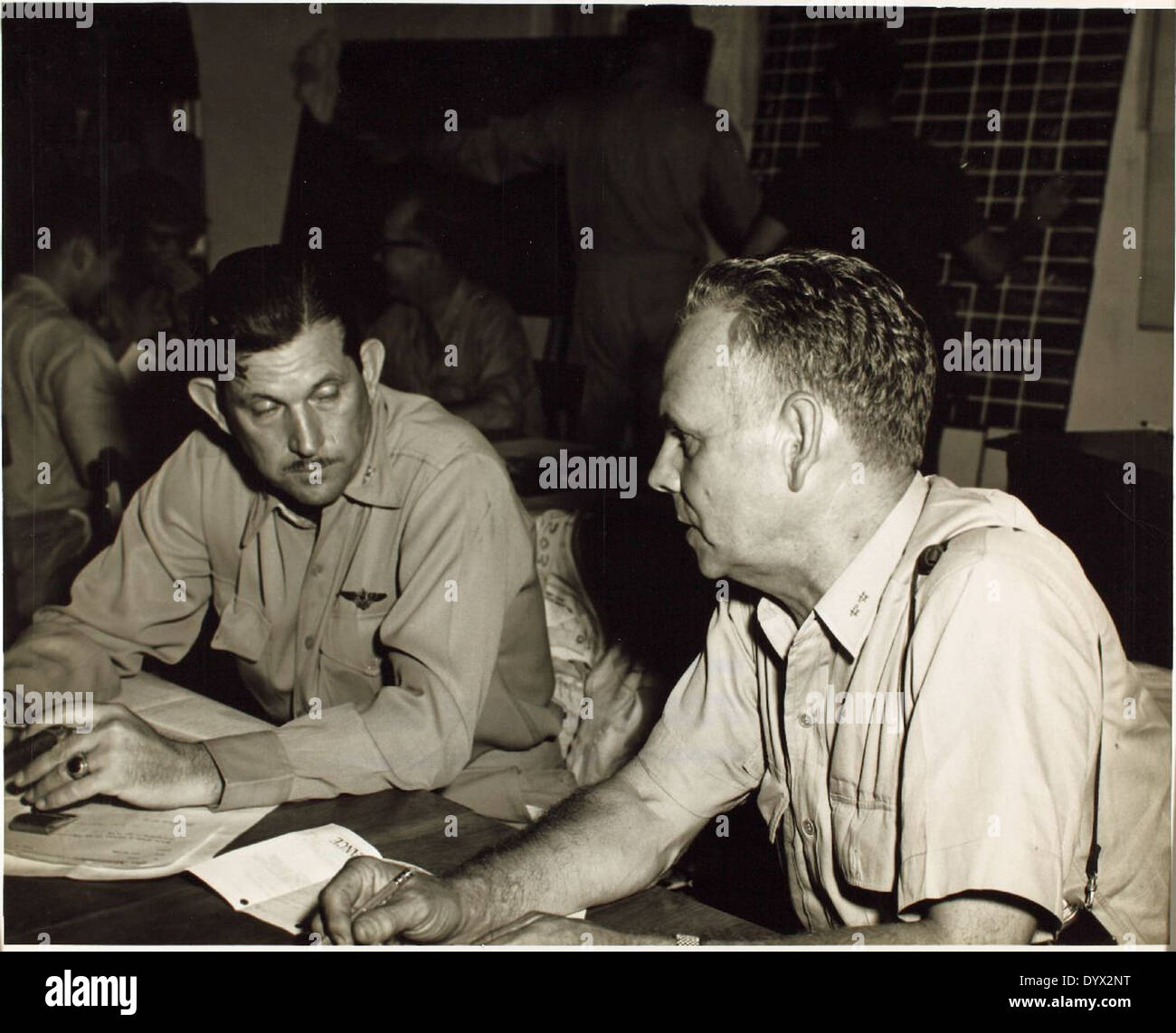 This image shows officers discussing an evacuation program for ...
