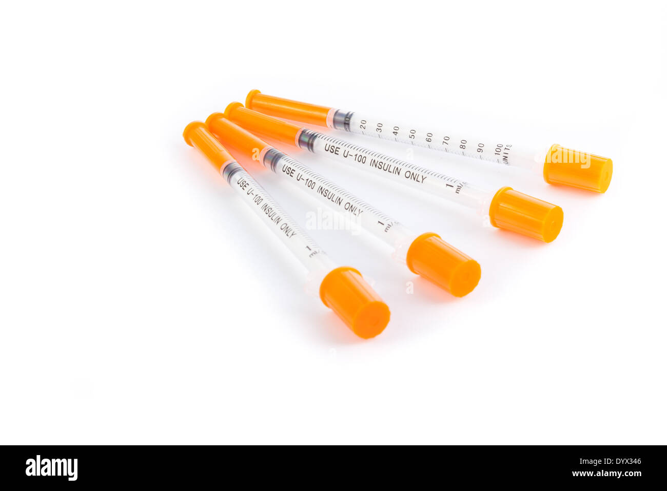 Four insulin syringes isolated on white Stock Photo - Alamy