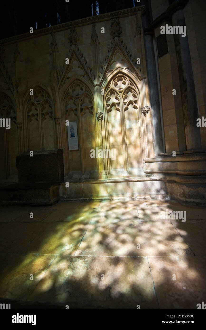 A reflection of light from a stained glass window in the interior of ...