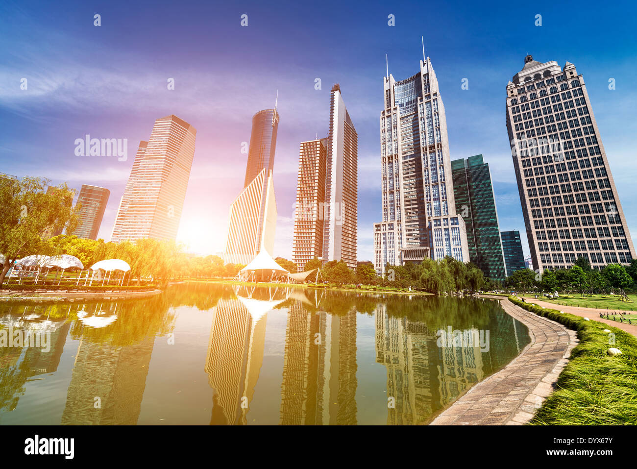 park and skyscrapers under the blue sky in shanghai Stock Photo - Alamy