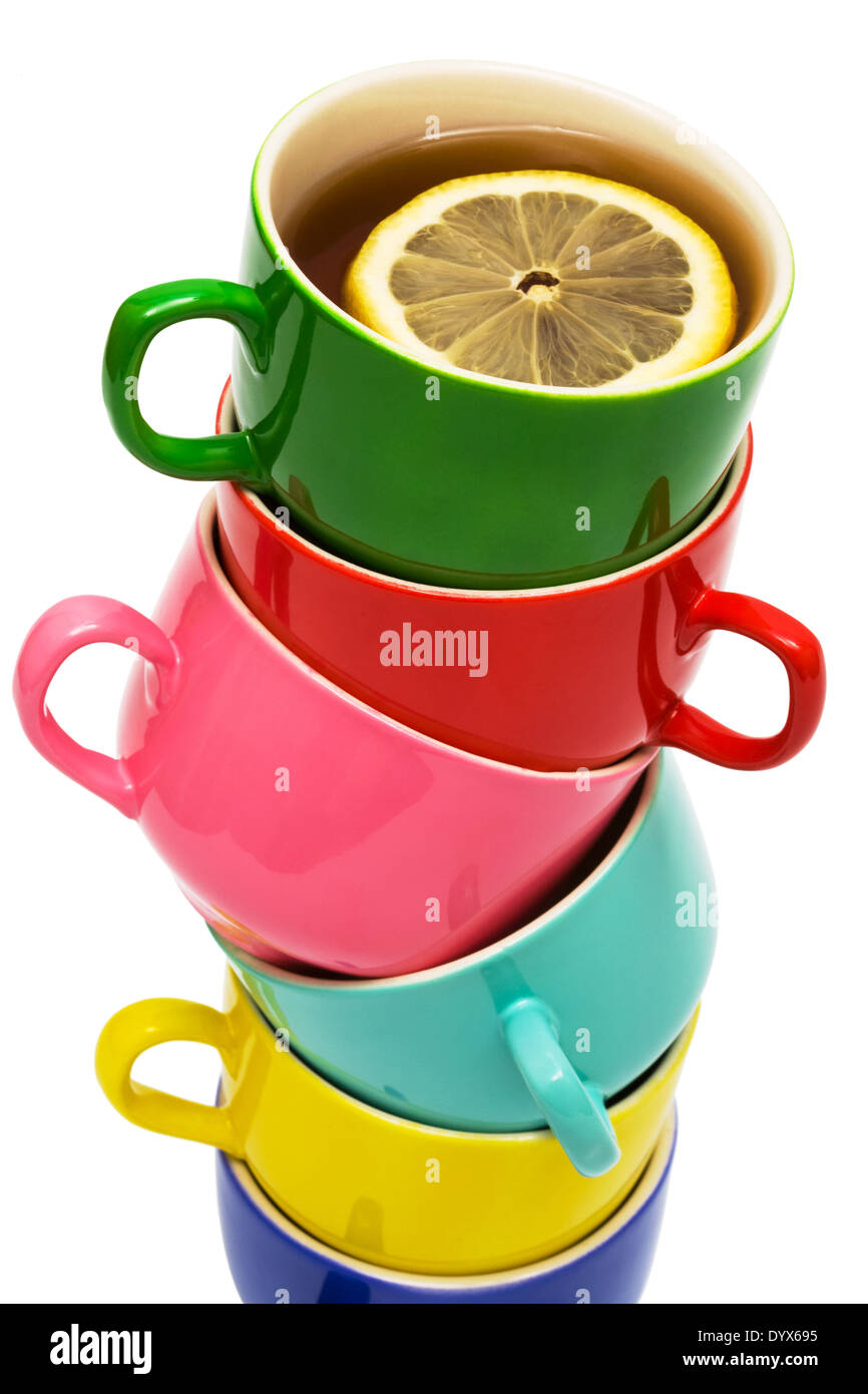 Beautiful color cups on a white background Stock Photo - Alamy