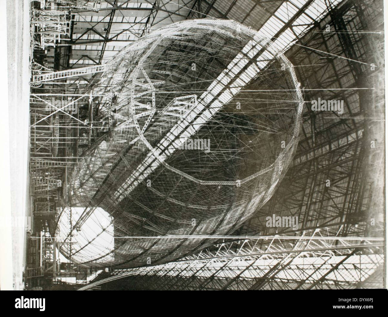 This image shows a Zeppelin airship inside a dirigible hangar ...