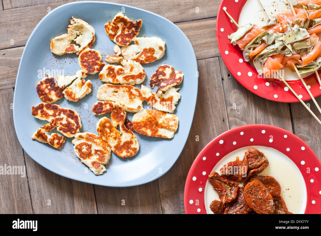 Cooked halloumi, smoked salmon kebabs and sun dried tomatoes Stock ...