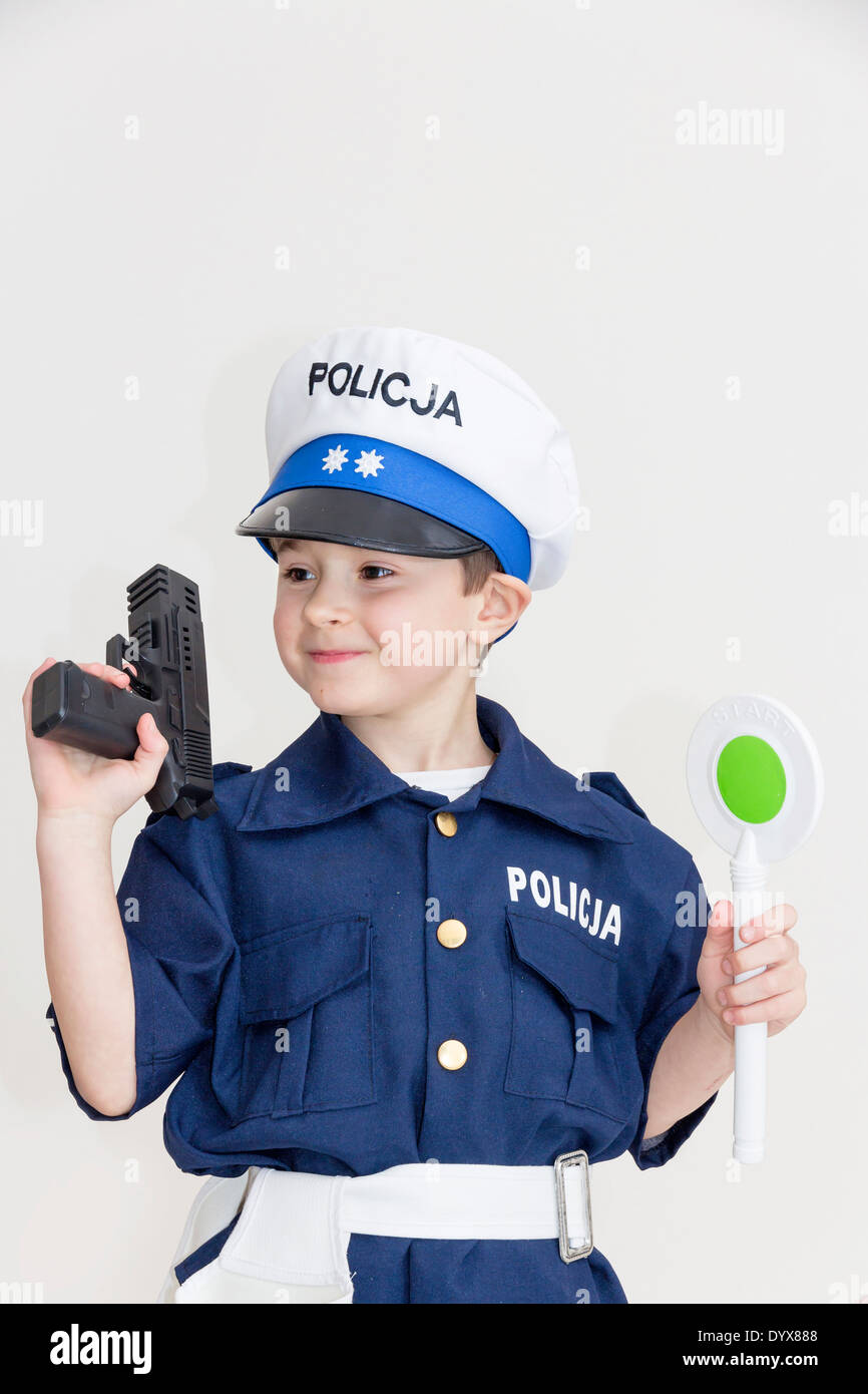 Boy age 6 boy pretending to be a police officer Stock Photo - Alamy