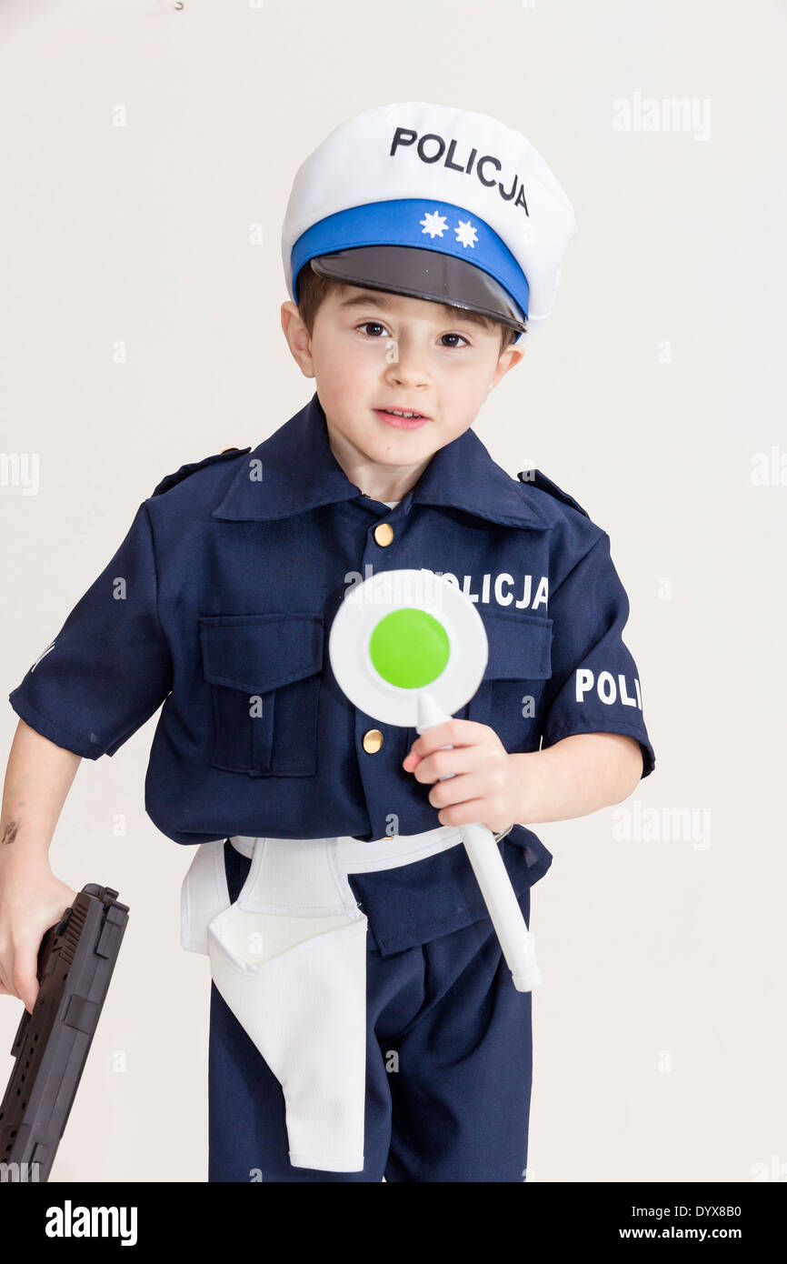 Boy age 6 boy pretending to be a police officer Stock Photo - Alamy