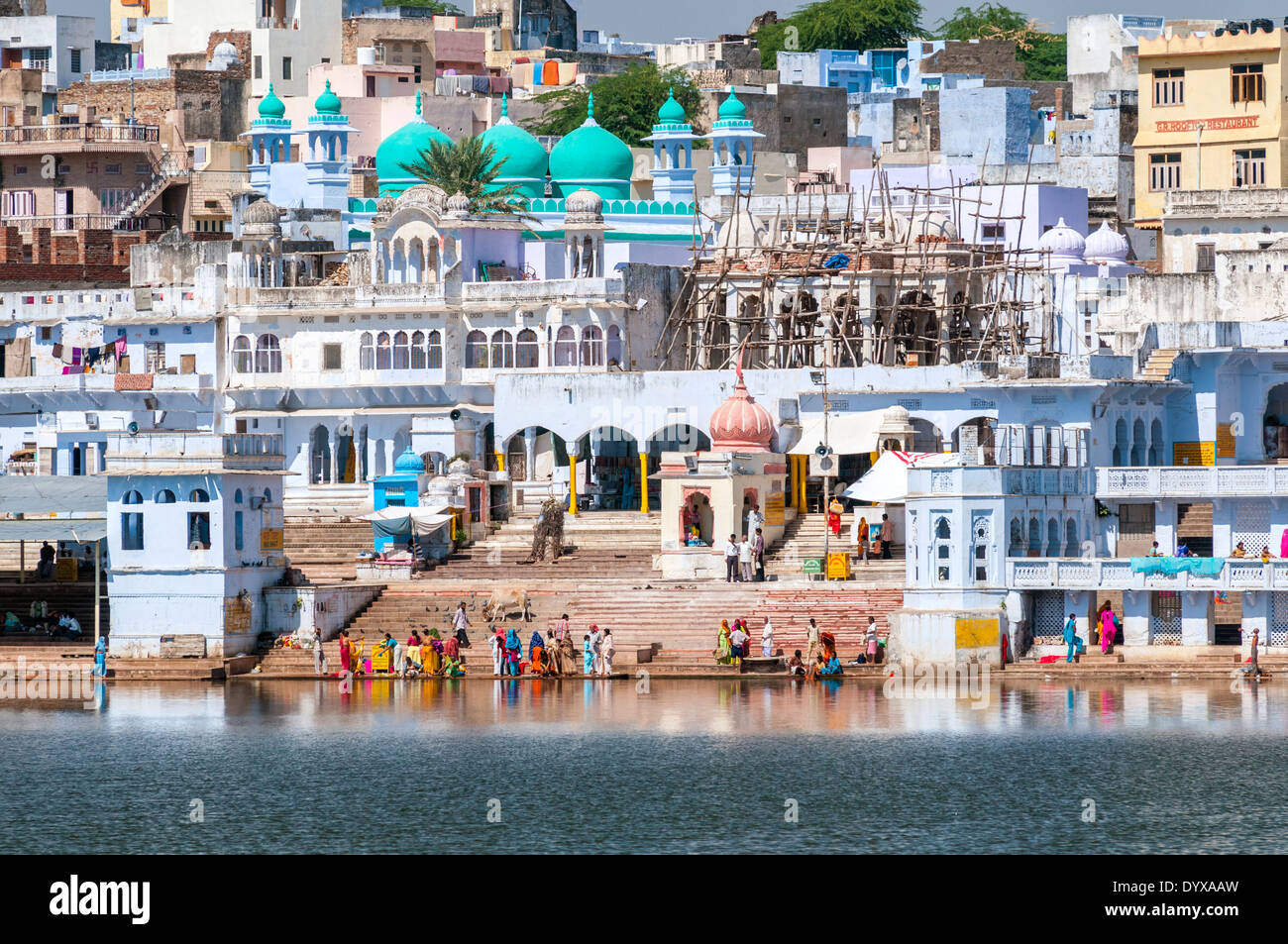 Pilgrims bathing in the holy Pushkar lake, Pushkar, Rajasthan, India ...