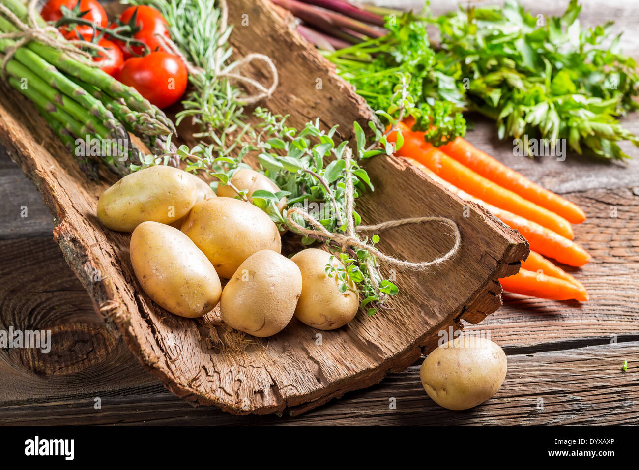 Various fresh vegetables on bark Stock Photo - Alamy