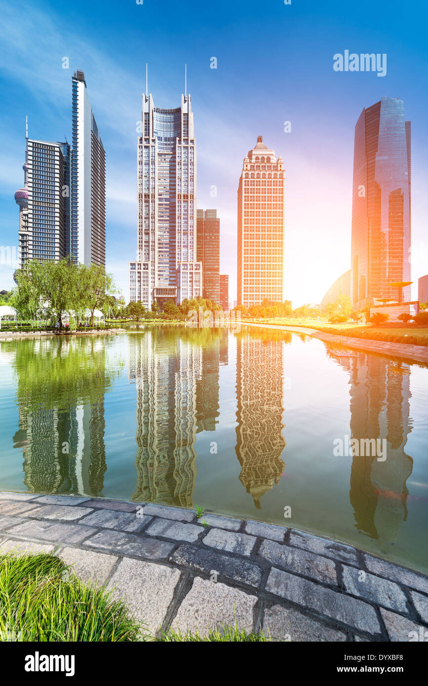 park and skyscrapers under the blue sky in shanghai Stock Photo - Alamy