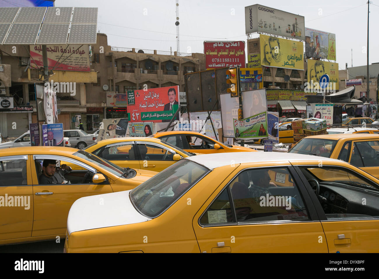 Baghdad. 26th Apr, 2014. Iraqi taxis are seen waiting for the traffic ...
