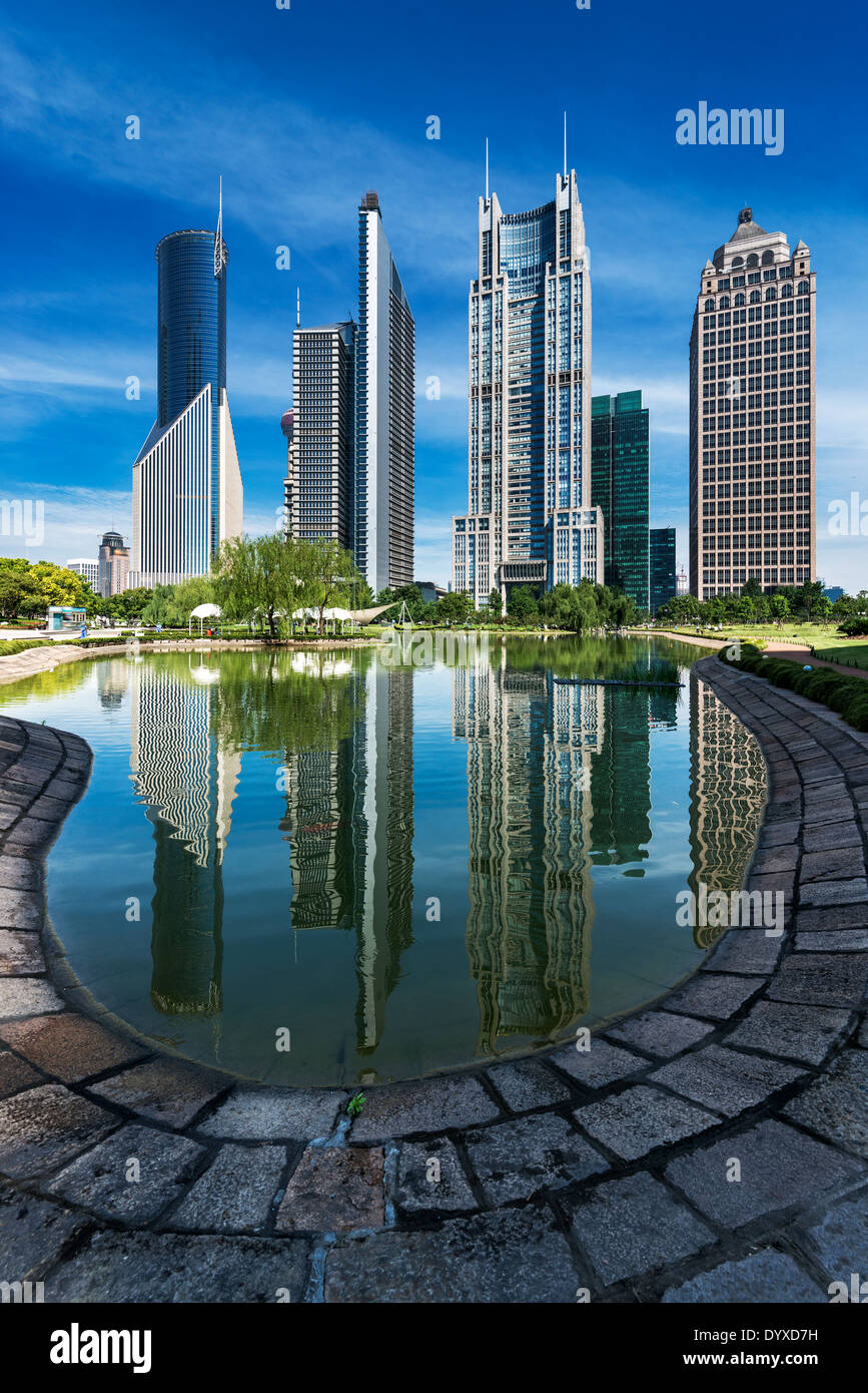 park and skyscrapers under the blue sky in shanghai Stock Photo - Alamy