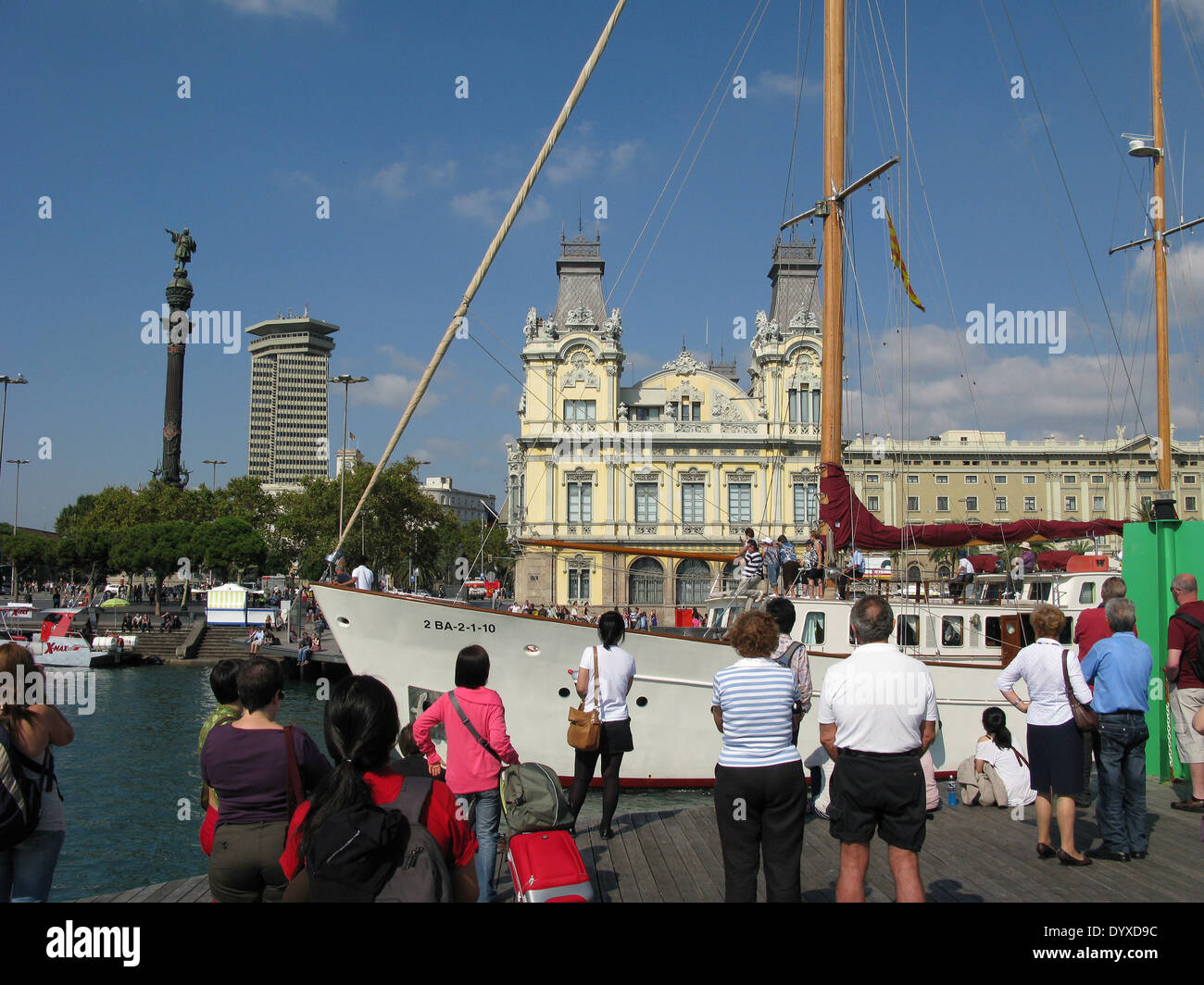People looks the boat aon the docks at Mediterranean Barcelona,Spain ...