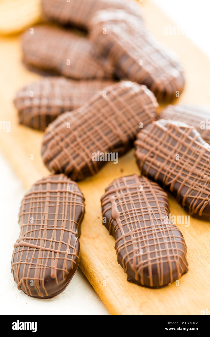 Gourmet Chocolate covered Nutter Butters with chocolate design on top ...