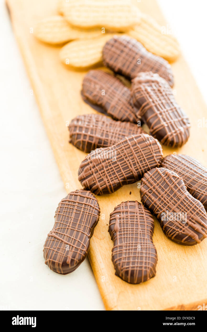 Gourmet Chocolate covered Nutter Butters with chocolate design on top ...