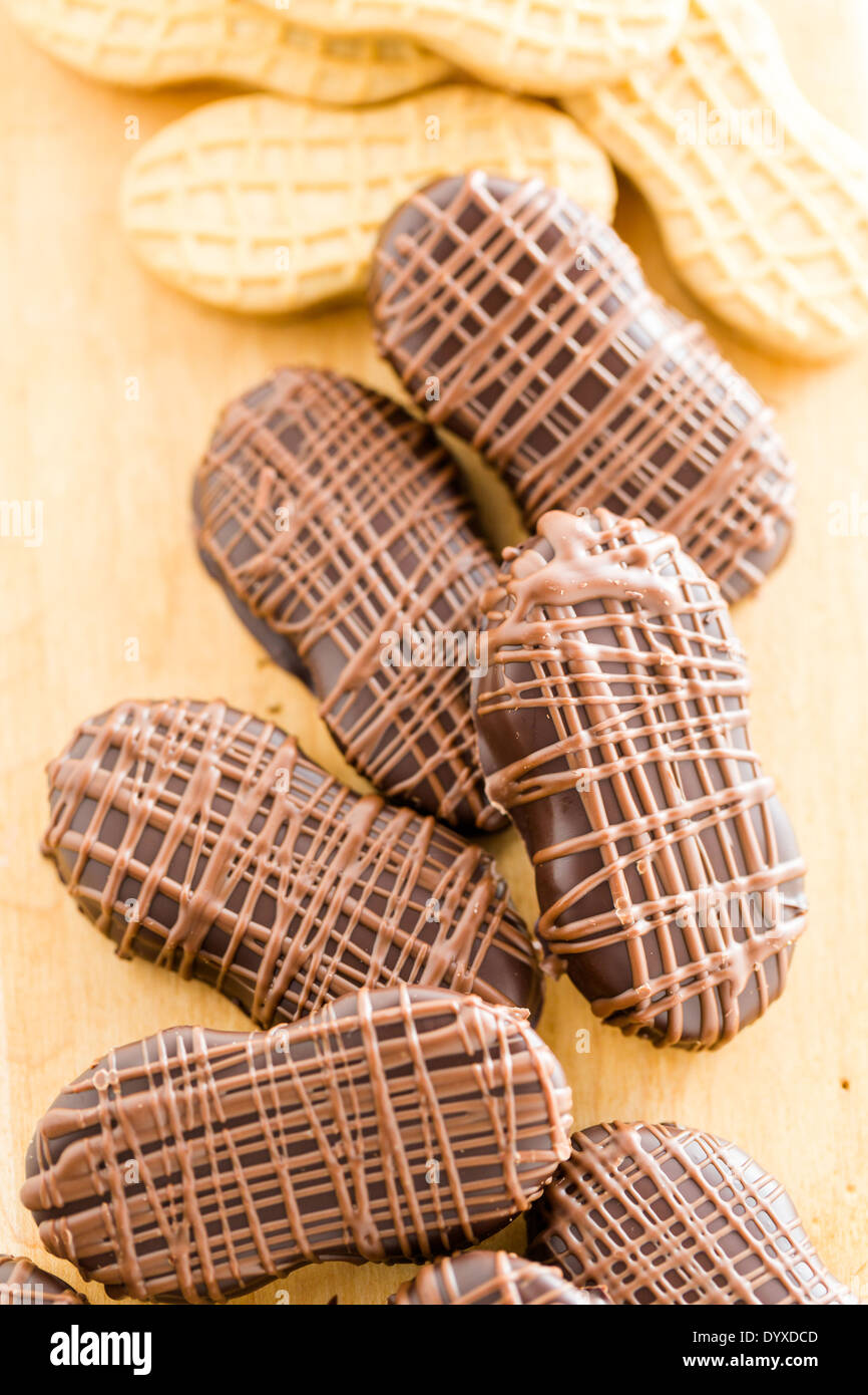 Gourmet Chocolate covered Nutter Butters with chocolate design on top ...