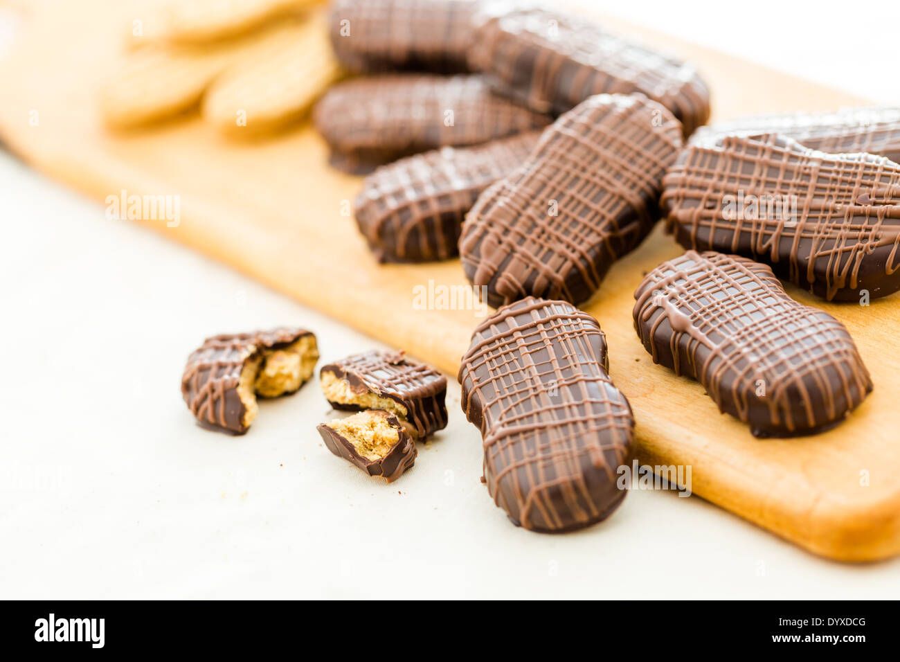 Gourmet Chocolate covered Nutter Butters with chocolate design on top ...