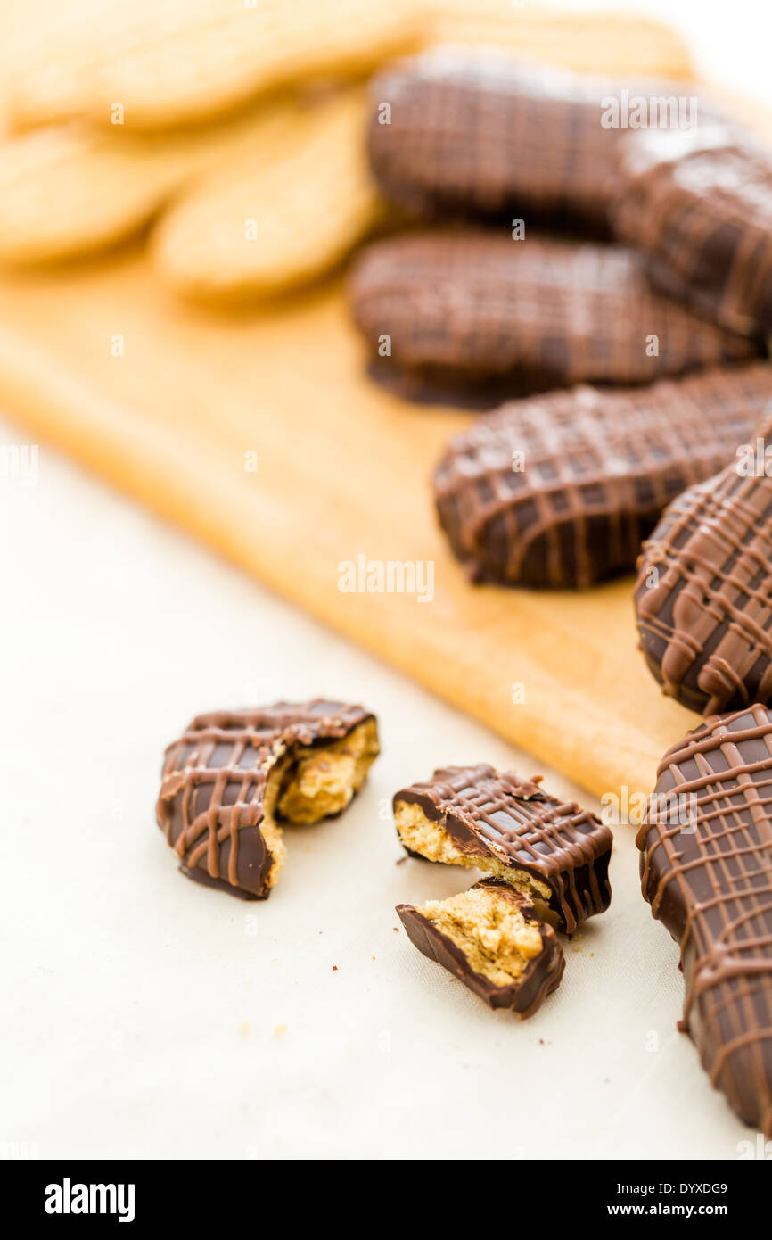 Gourmet Chocolate covered Nutter Butters with chocolate design on top ...